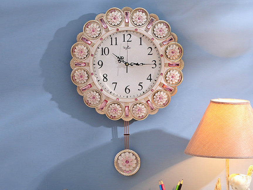 Metallic Gold Clock with Pendulum adorned with Pink Stone Accents ...
